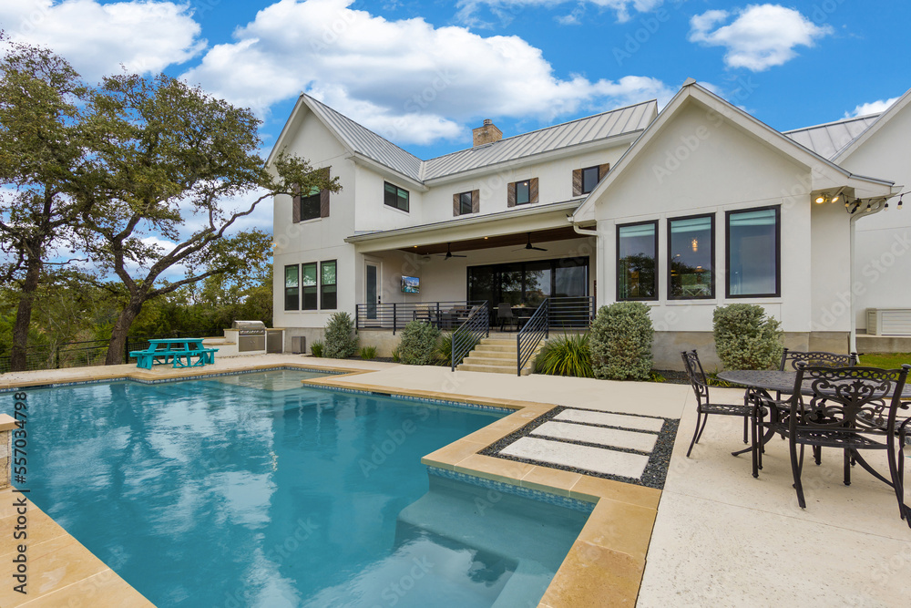 Large white house with a pool Stock Photo | Adobe Stock