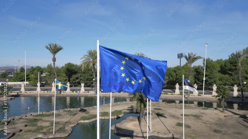 Footage of an EU European flag and flag poole blowing in the wind on a ...