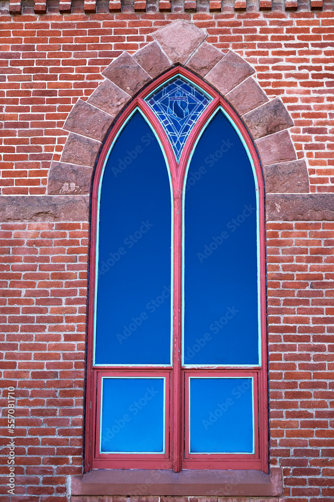 Old Arched Window with Tinted Glass in a Brick Building Stock Photo ...