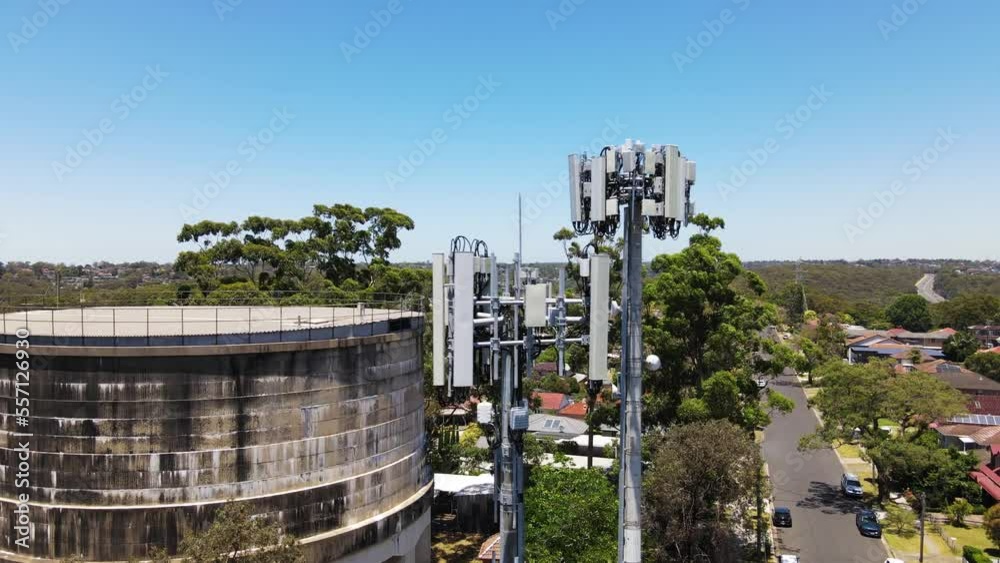 Aerial drone close up view and flypast of two mobile telecommunication ...