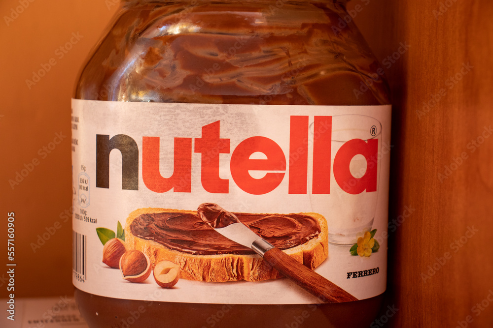 Nutella hazelnut spread jar. Brand name of a sweetened hazelnut cocoa ...