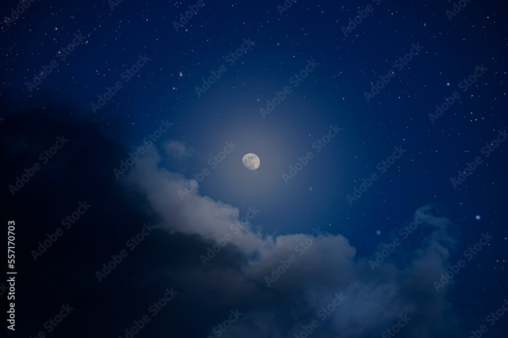 Moonlit night sky with clouds and stars Stock Photo | Adobe Stock