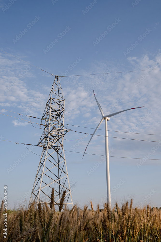 Power transmission line works from windmill energy. Ecofriendly wind ...