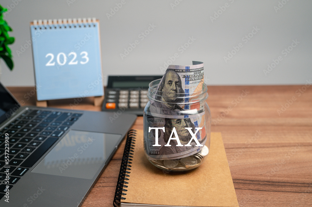 Desktop calendar for 2023 on desk beige. plan pay tax year. Calendars ...