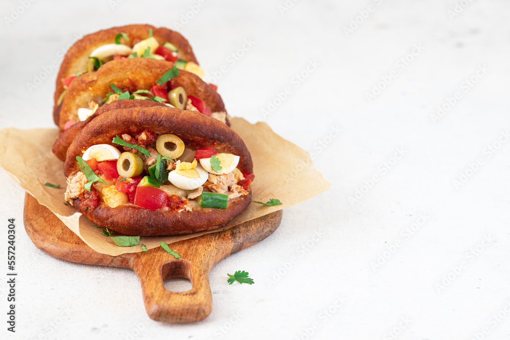Fricasse is a savory donut filled tuna, potato,boiled egg, olives and ...