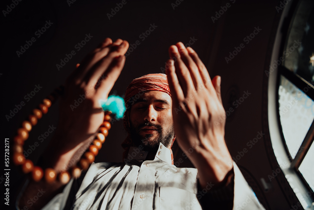 Muslim Arabic man praying. Religious muslim man praying inside the ...