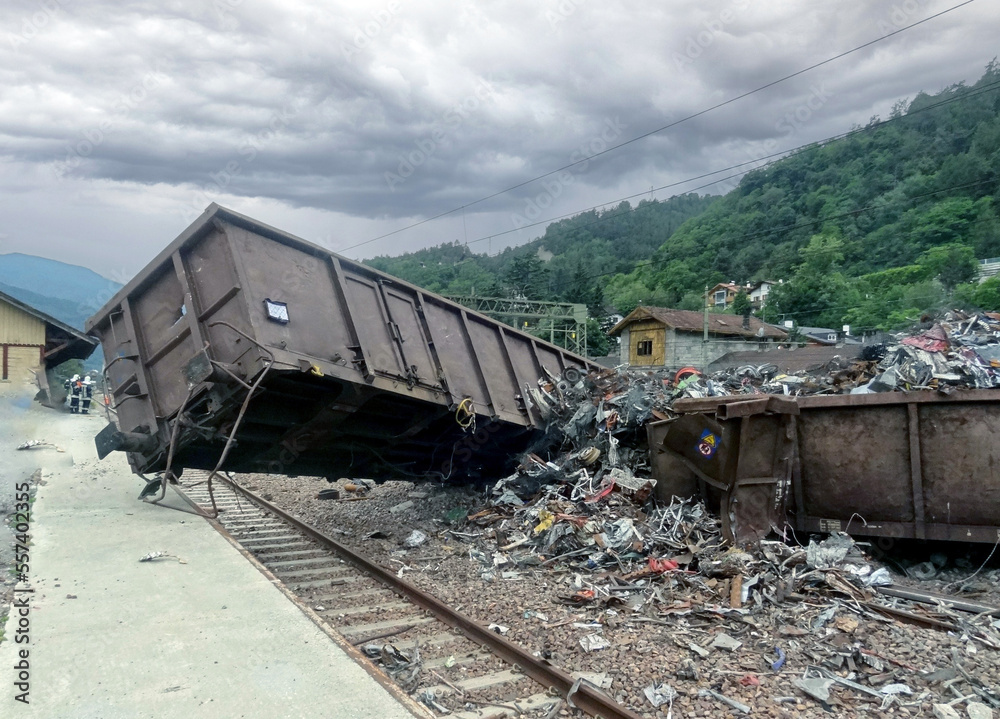 Massive freight train derailed along the tracks. Tracks, freight ...