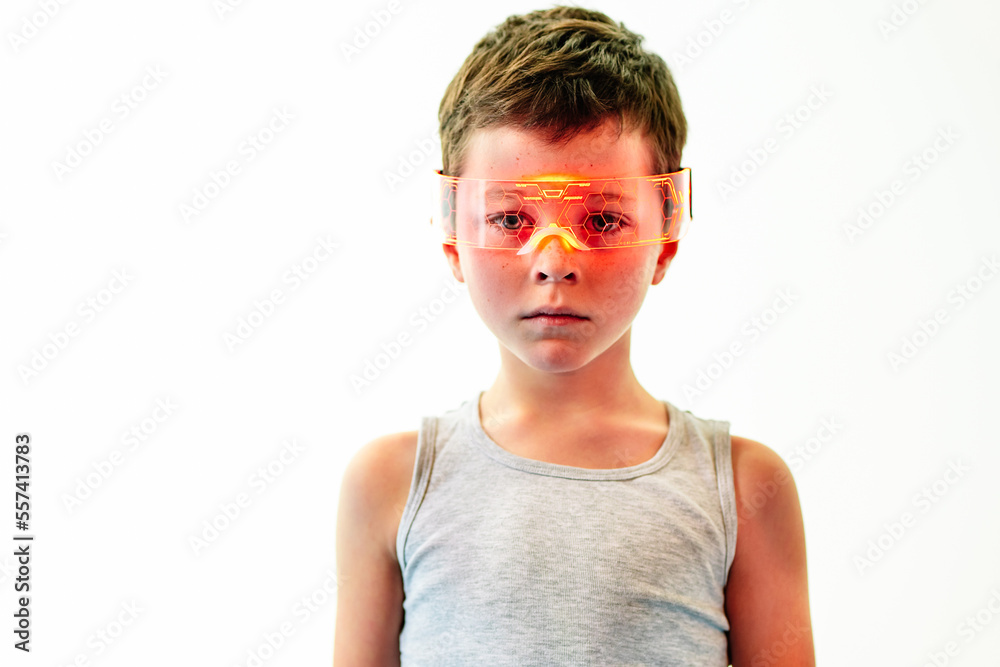 Little boy in futuristic goggles on white background Stock Photo ...