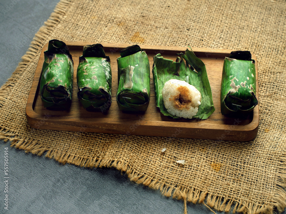 lemper bakar (grilled lemper) indonesian traditional food on burlap ...