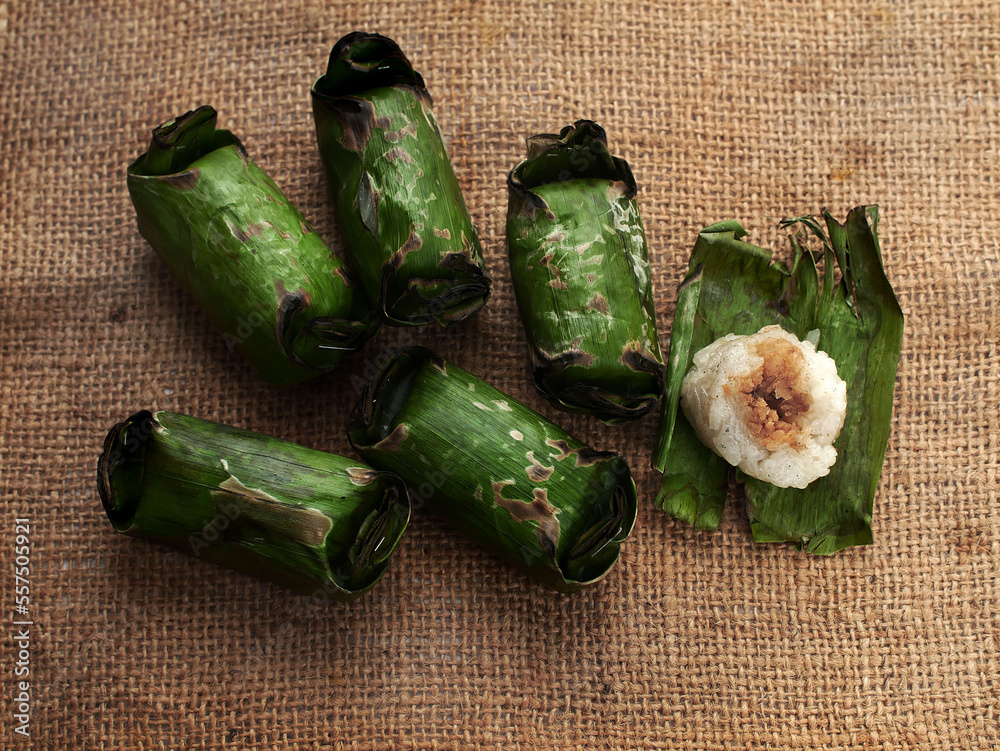 lemper bakar (grilled lemper) indonesian traditional food on burlap ...
