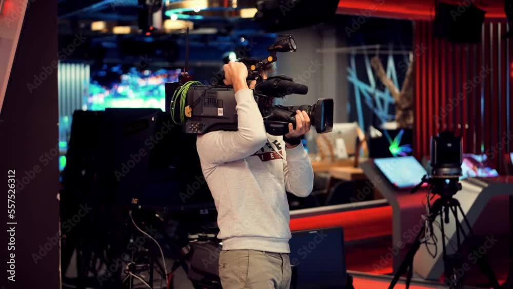cameraman working in tv studio video production filming interview ...