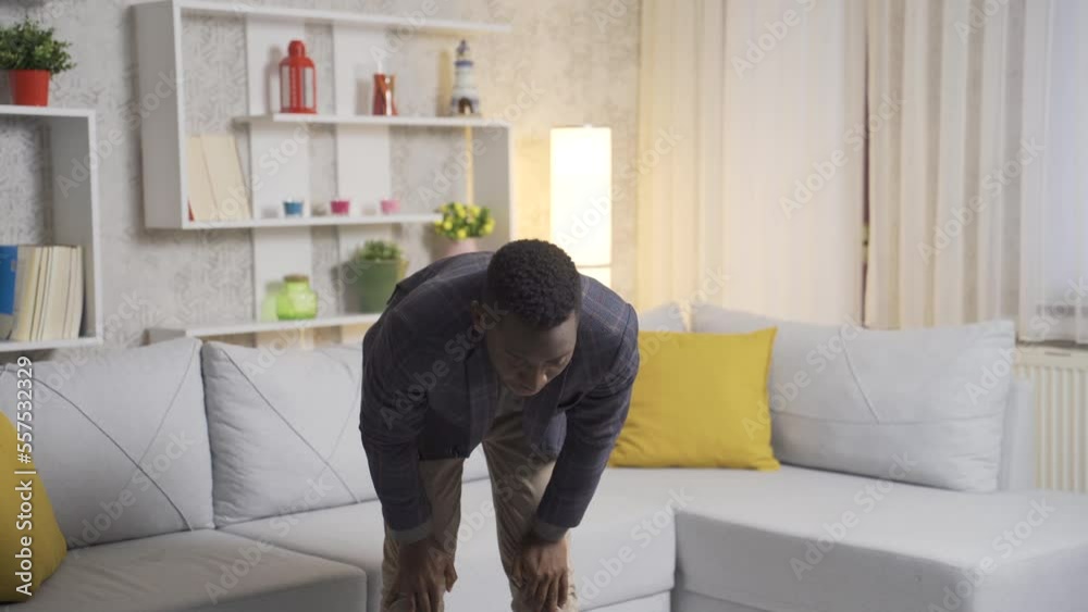 African Muslim young man praying at home, worshiping Allah. Muslim ...