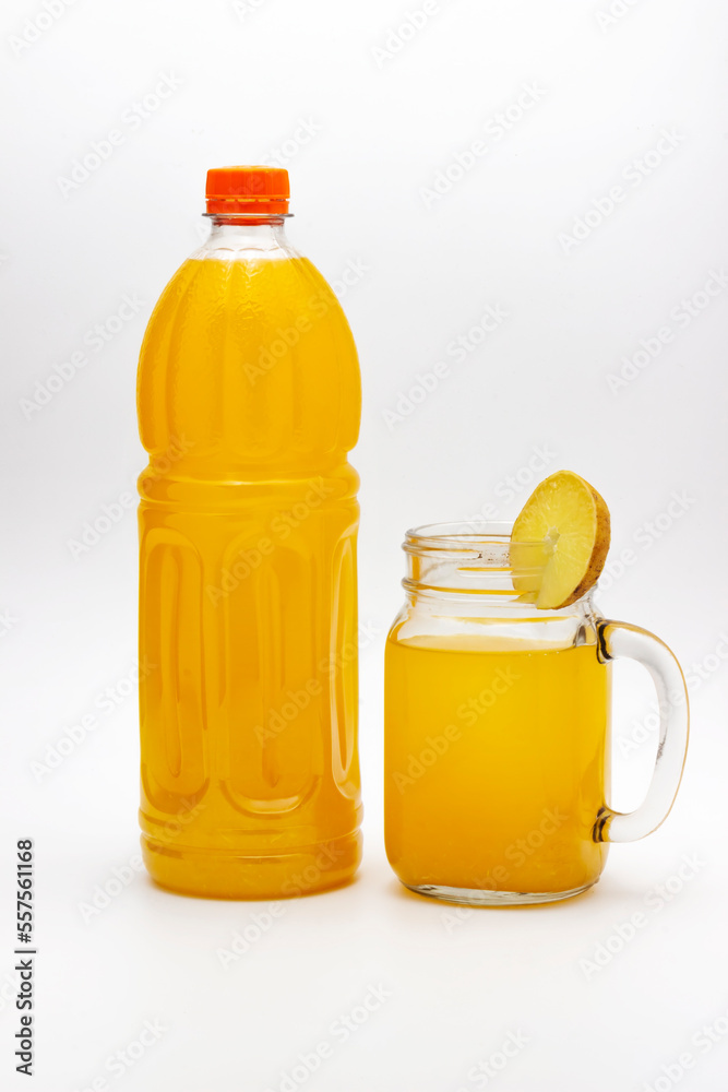 Glass of orange juice and orange juice bottles isolated on white ... Glass of orange juice and orange juice bottles isolated on white ...