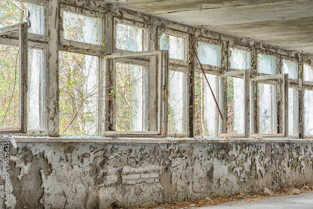Old window frames with broken glass. Abandoned factory building Stock ...