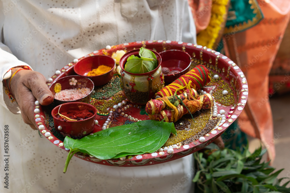 Indian Hindu Pooja thali during a festival or marriage. Kumkum, haldi ...