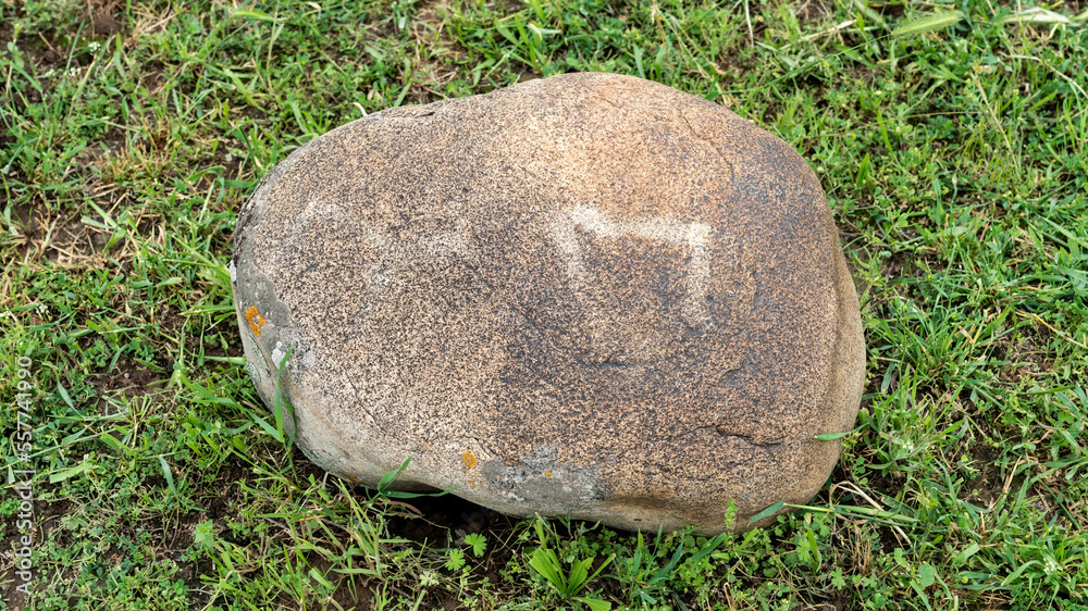 Petroglyph in Kyrgyzstan. An ancient rock carving and engraving known ...