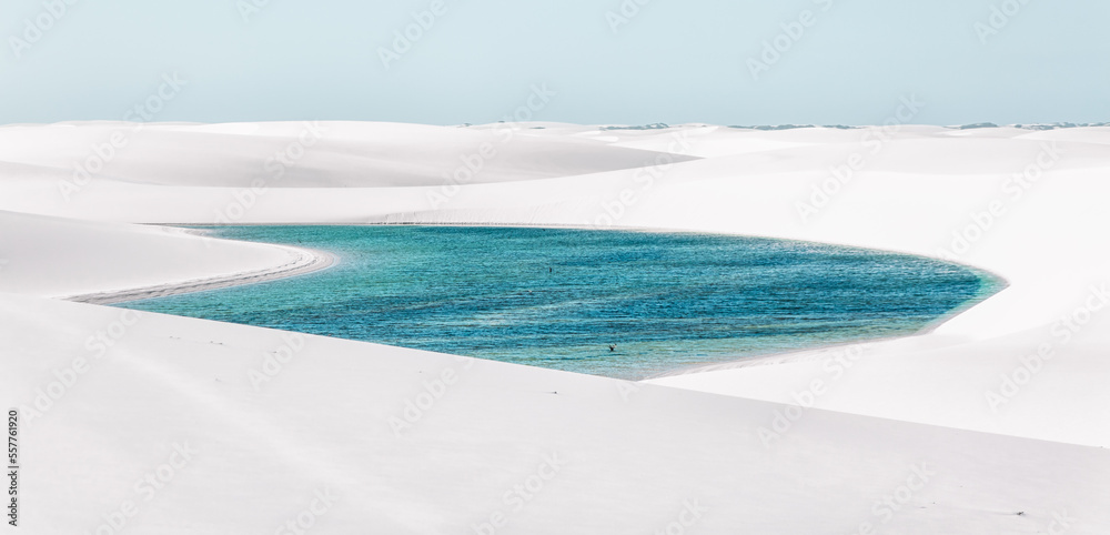 rainwater pond among the white sand dunes of Lencois Maranhenses Stock ...