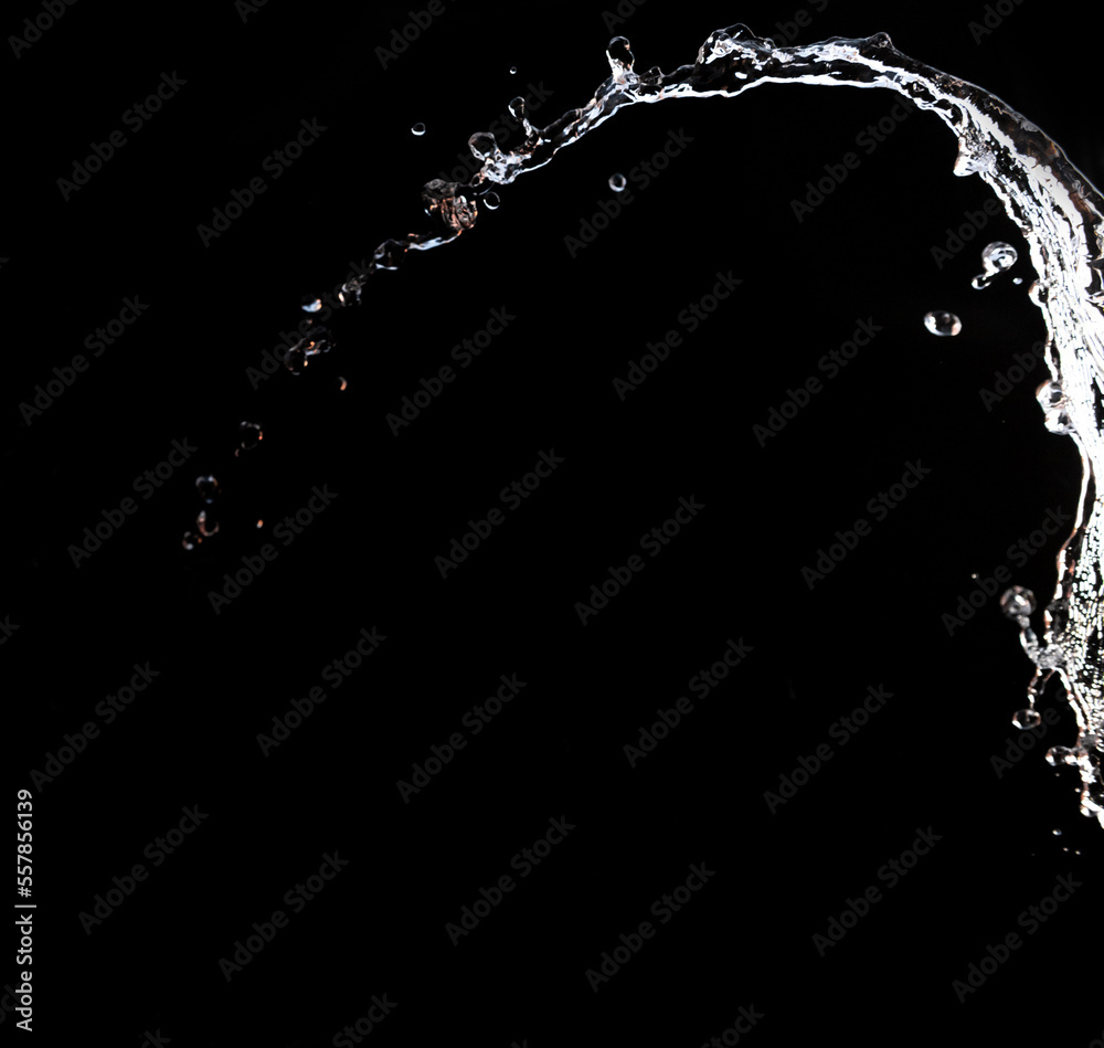 Water splash on the black background Stock Photo | Adobe Stock