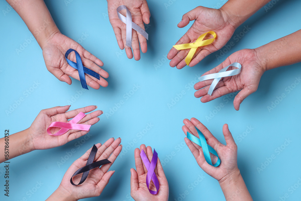 World Cancer Day Hands Of People Open And Holding Colorful Awareness