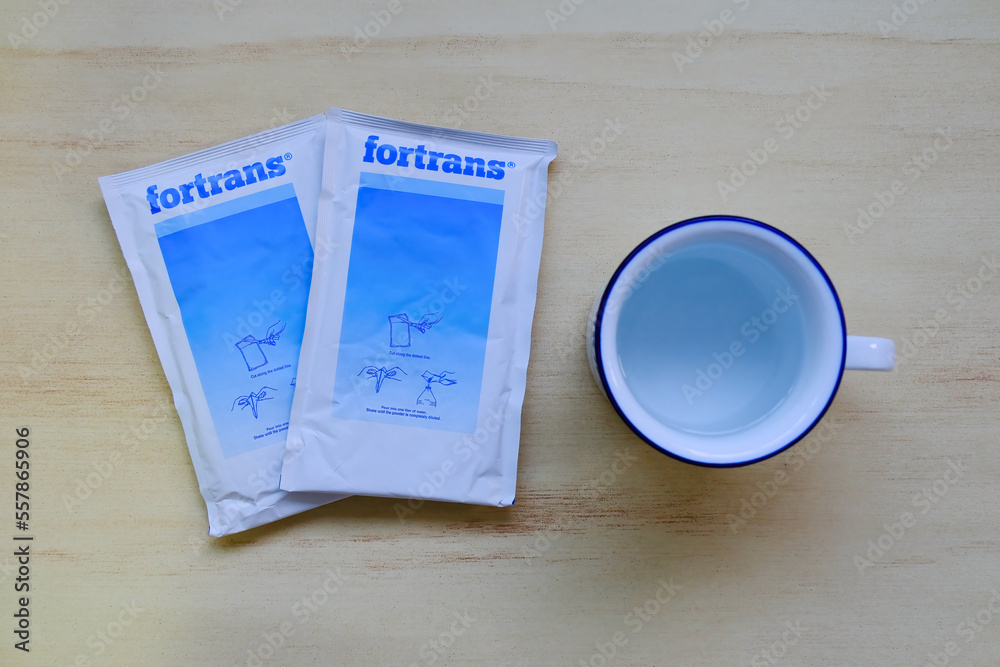 Singapore 2021 - 2 packets of Fortrans with a cup of water on tabletop ...