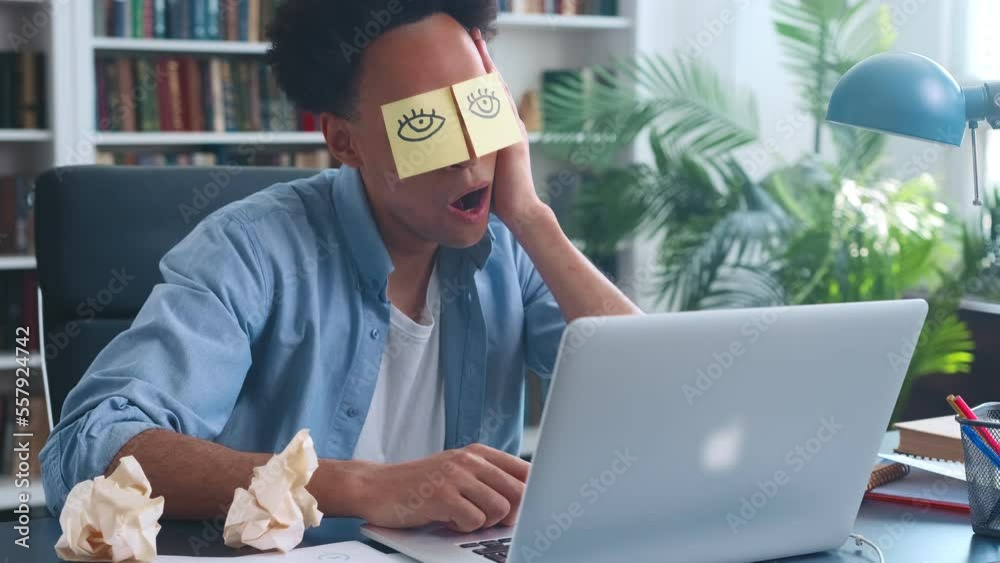 Young procrastinating African American man generation z with stickers ...