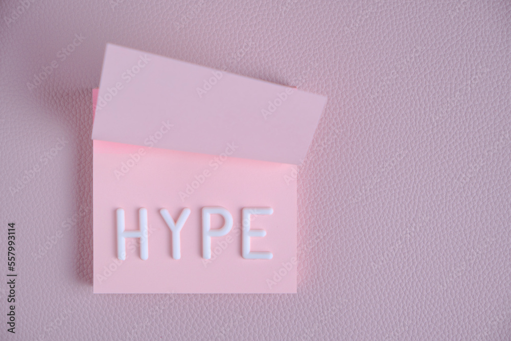 Word hype laid out white letters pink piece paper.Concept hype ...