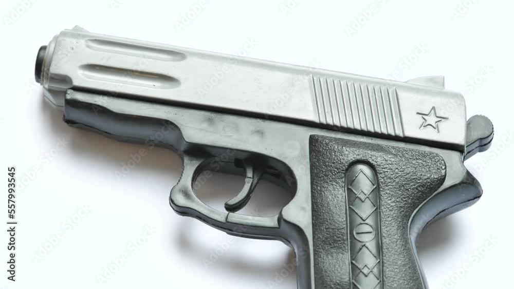 A simple small cheap plastic fake realistic toy gun prop object detail ...