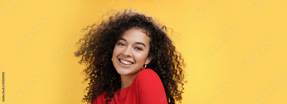 Romantic and flirty young cute caucasian girlfriend with curly hair in ...