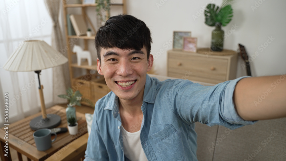 happy asian Japanese man is talking and explaining with hand gestures ...