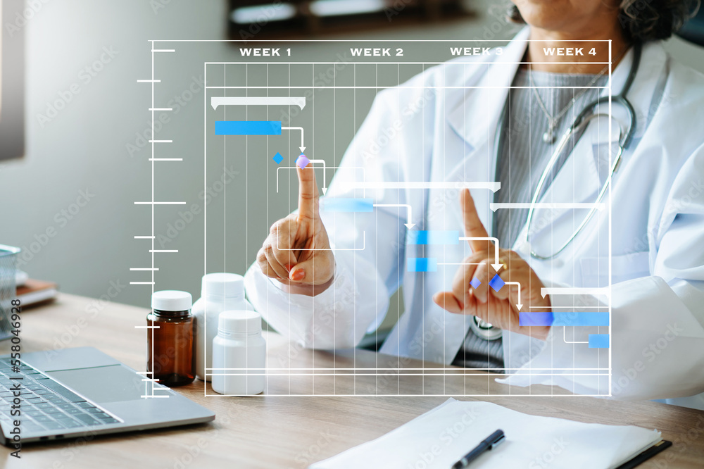 Project manager working and update tasks with Gantt chart scheduling ...