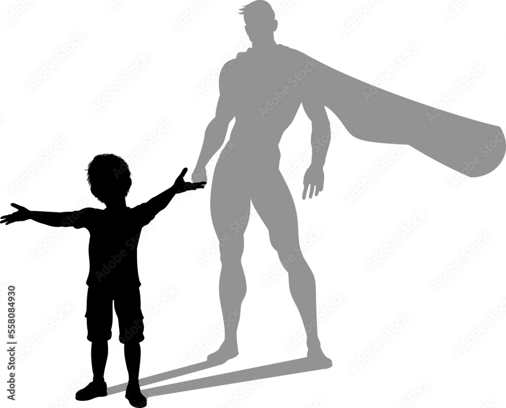 A superhero child or kid boy revealed by his shadow silhouette as a ...