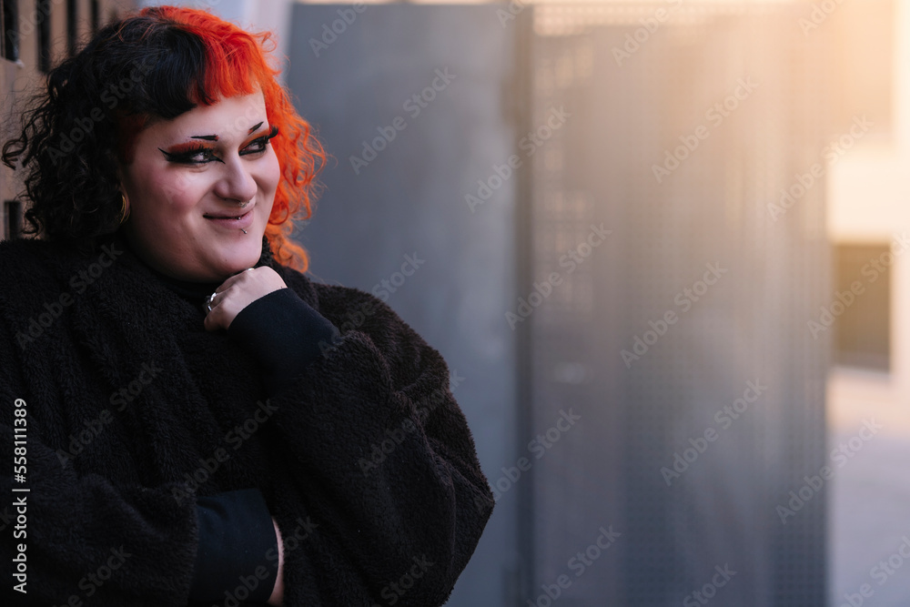 Transgender girl with painted hair posing to the camera. Stock Photo ...