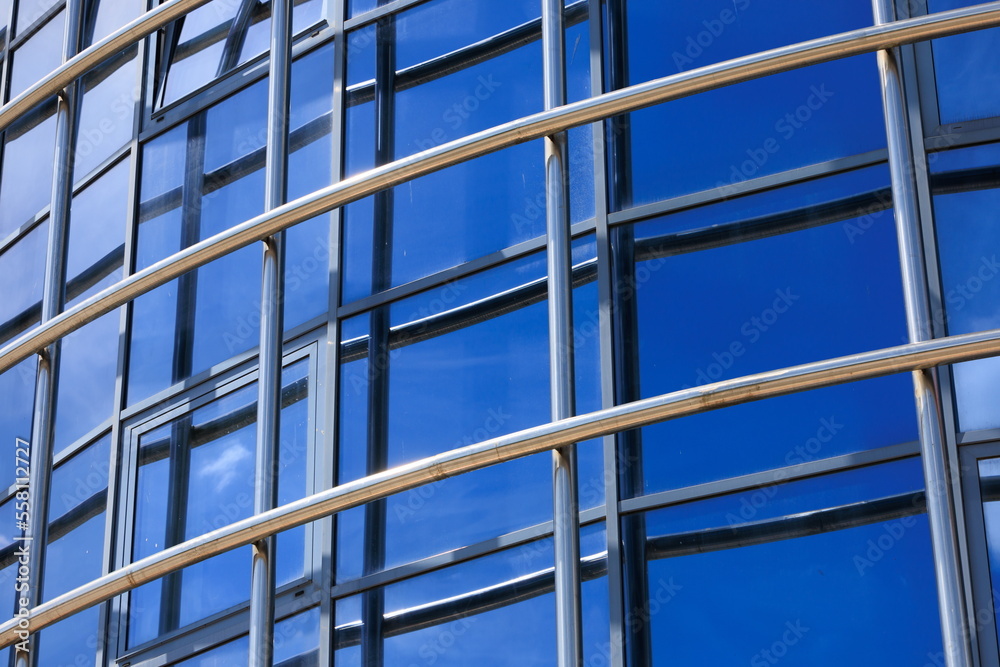 windows and metal structure on the wall of modern buildings of business ...