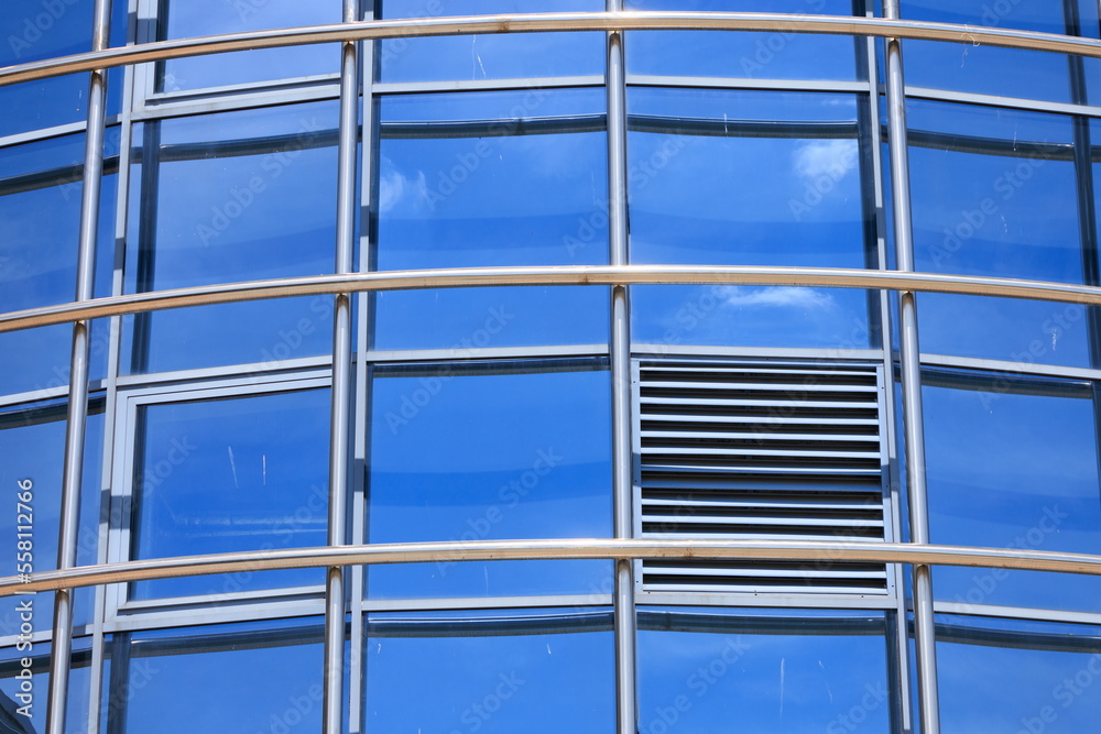 windows and metal structure on the wall of modern buildings of business ...