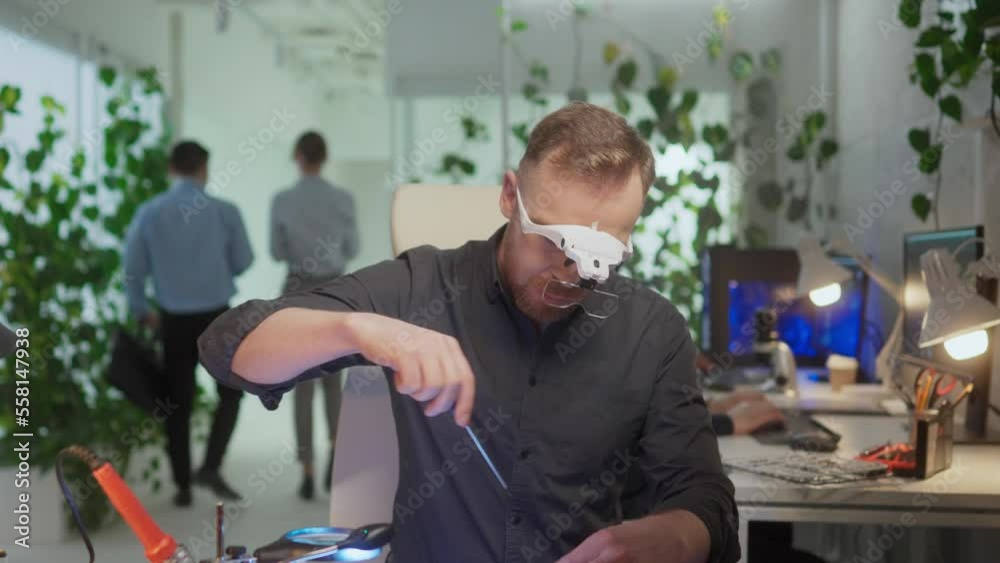 Portrait of young attractive technician of service repairing ...