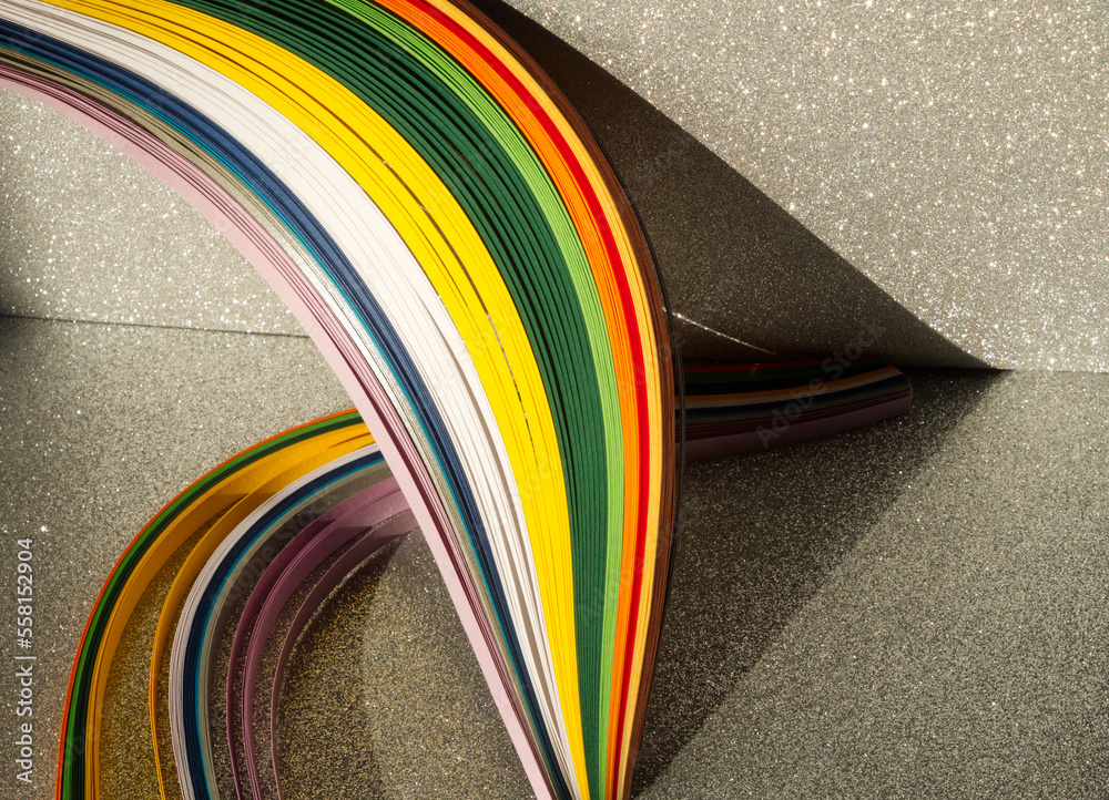 Abstract paper. Colorful rainbow strip wave paper on sparkling silver ...