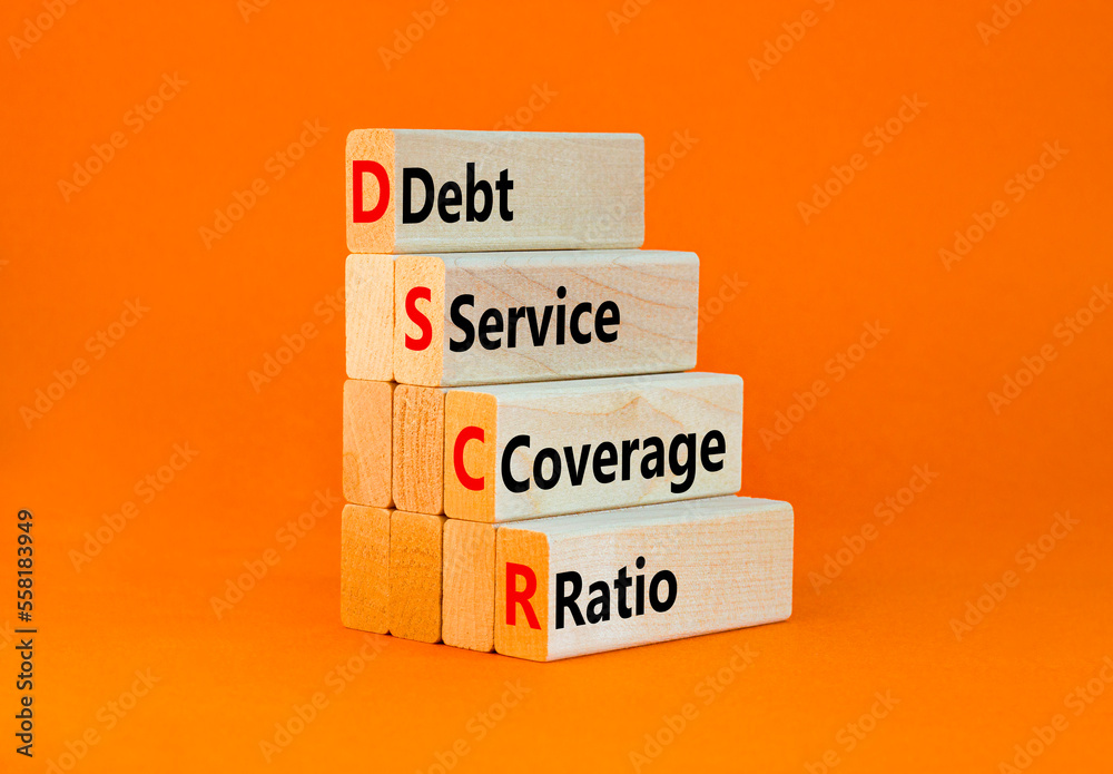 DSCR debt service coverage ratio symbol. Concept words DSCR debt ...