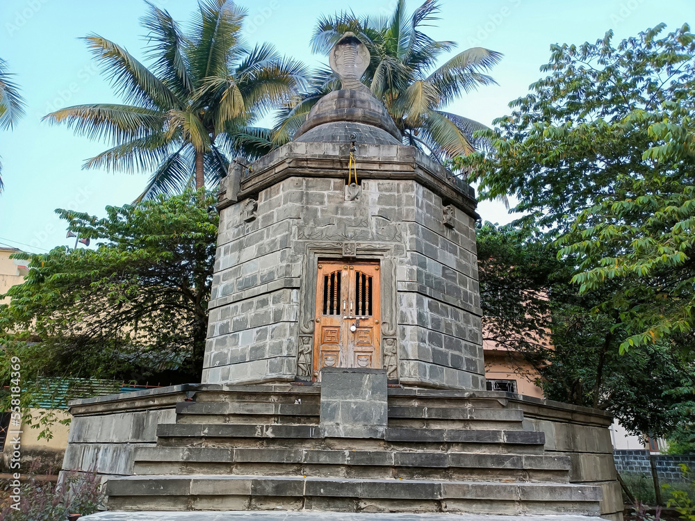 Stock photo of snake temple made up from stones, stone made snake idol ...