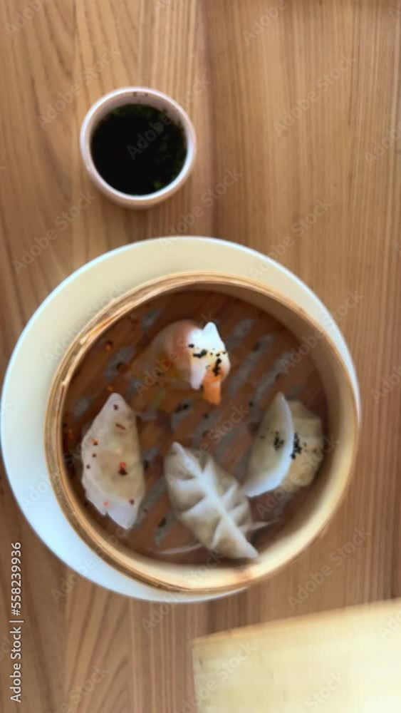 dim sam 4 types with different fillings Wooden boxes covered with a ...