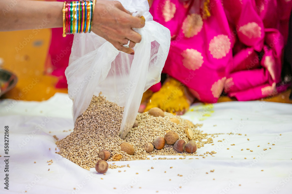 Indian Hindu bride's pre wedding haldi yellow turmeric ceremony fet ...