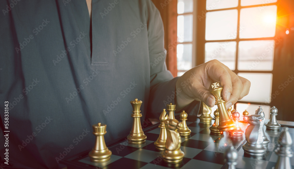 Concentrated businessman developing chess gambit, strategy ,playing ...