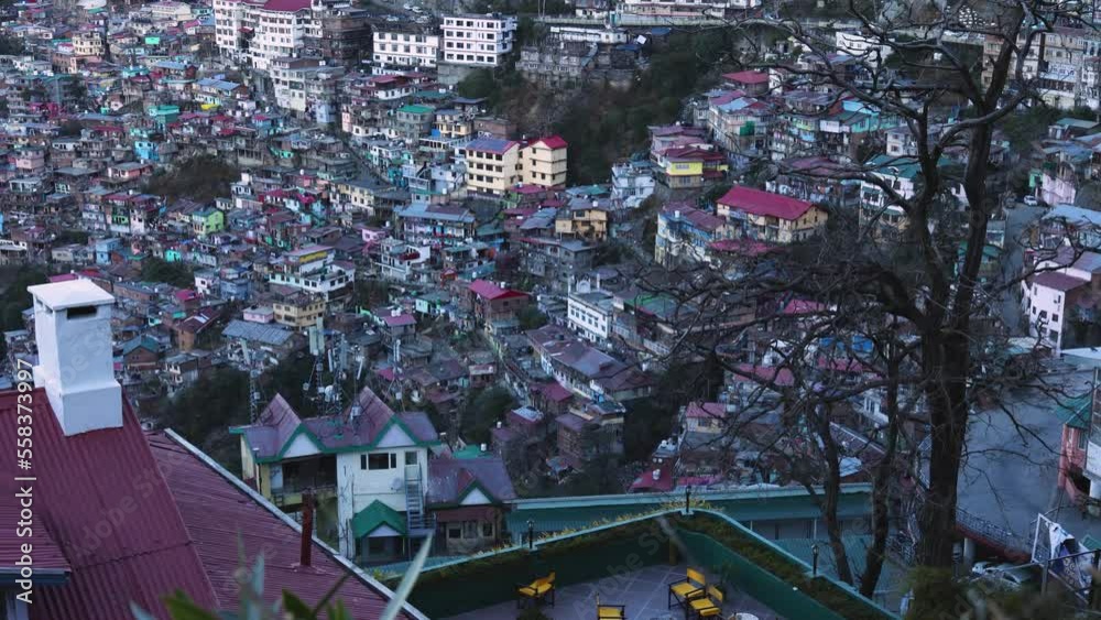 Many houses on a densely populated hillside in Shimla Northern India ...