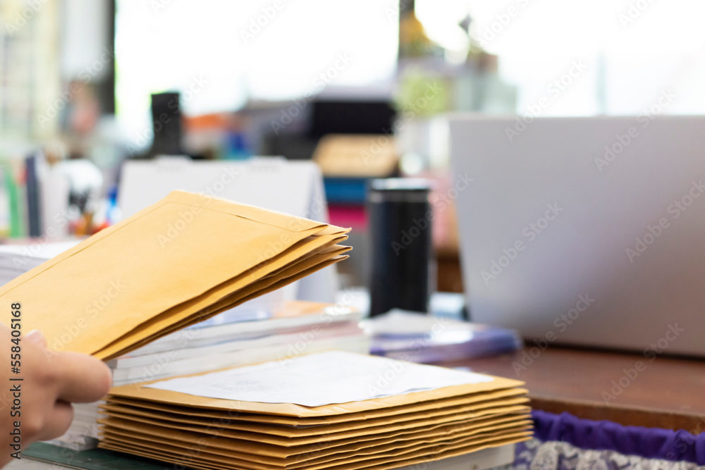 Soft focus of office clerk or secretary is preparing documents and ...