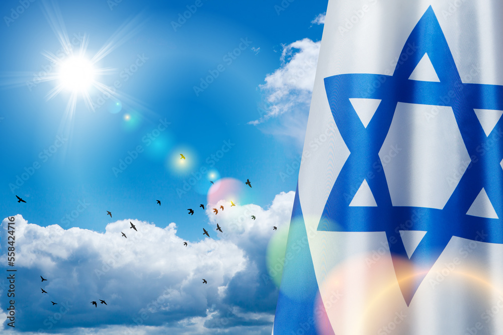 Israel flag with a star of David over cloudy sky background with flying ...