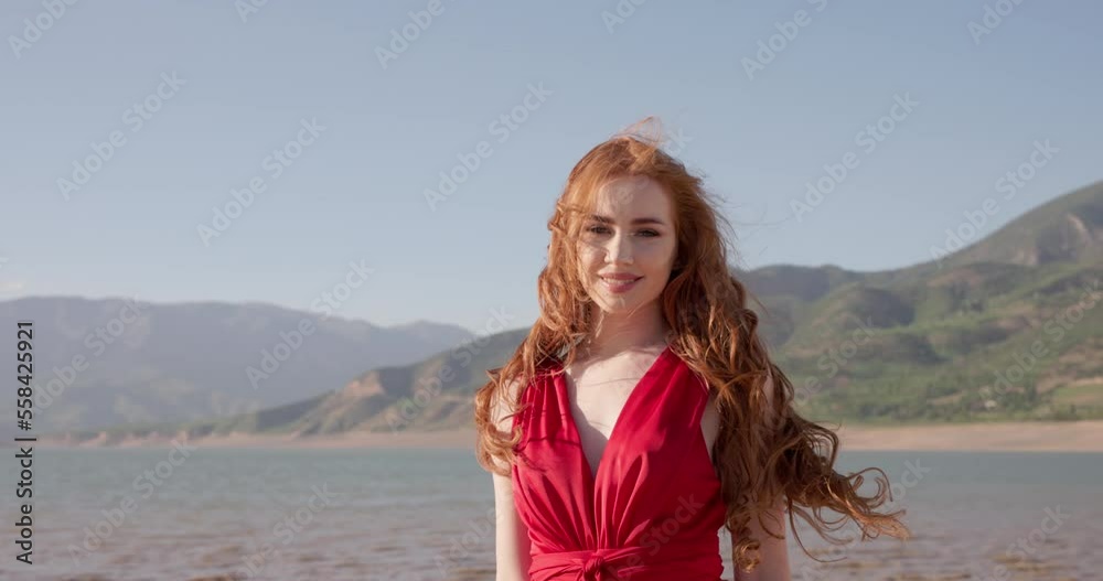 Face young sunshine woman with red hair. Beautiful ginger lady look at ...