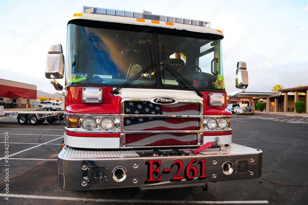 Front view of a fire engine parked on a parking lot of commercial ...