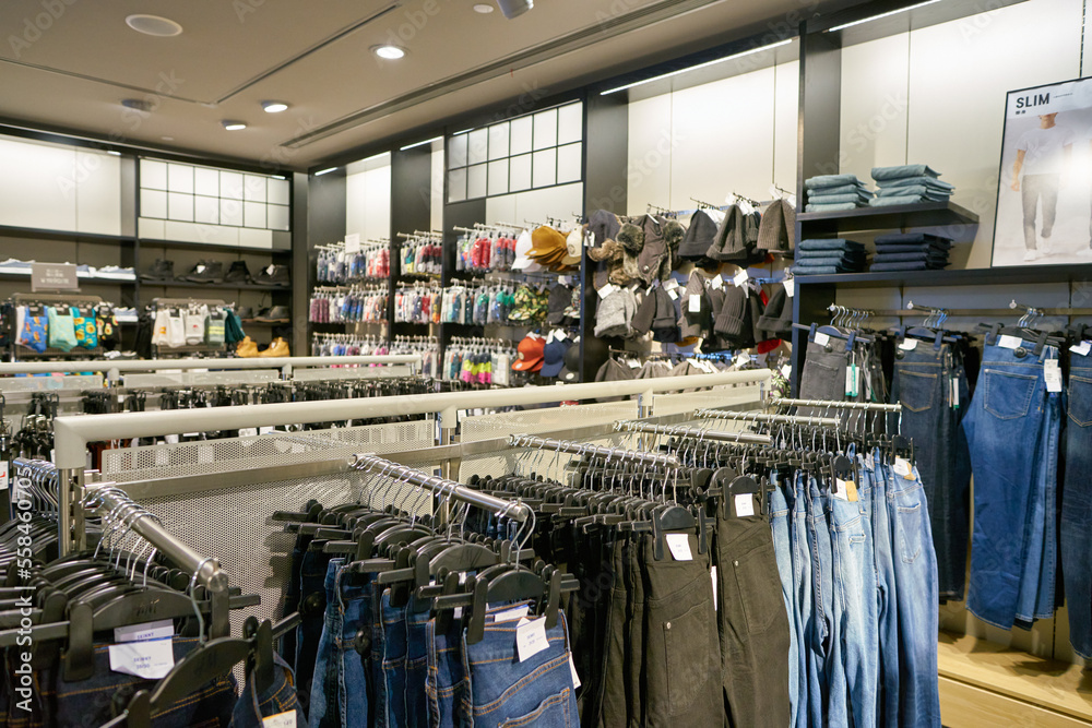 SHENZHEN, CHINA - CIRCA NOVEMBER, 2019: apparel on display at H and M ...