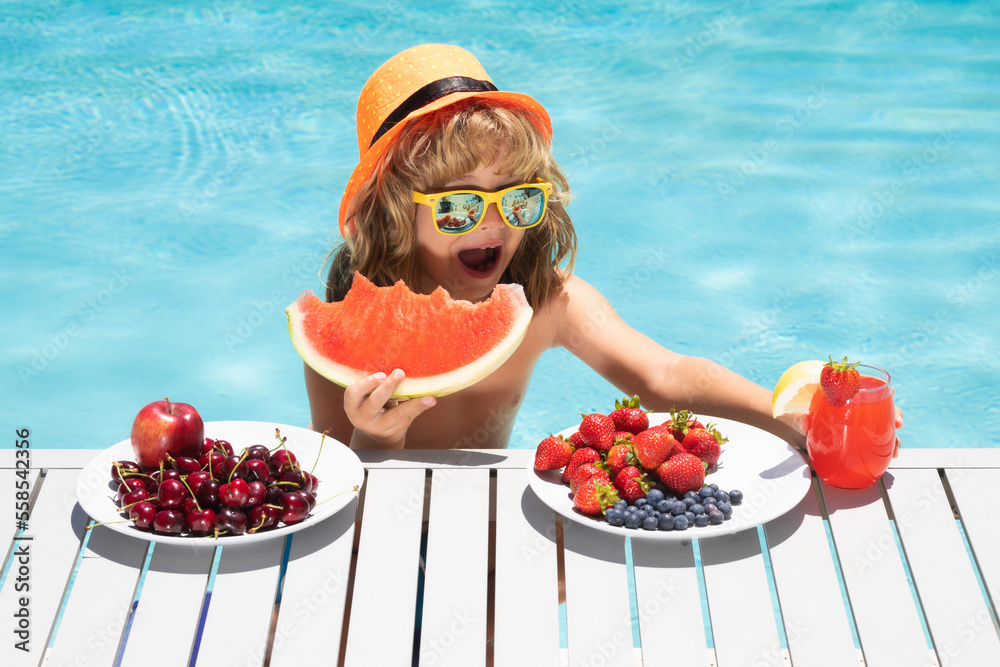 Healthy food. Outdoor leisure activity with kids by swimming pool ...