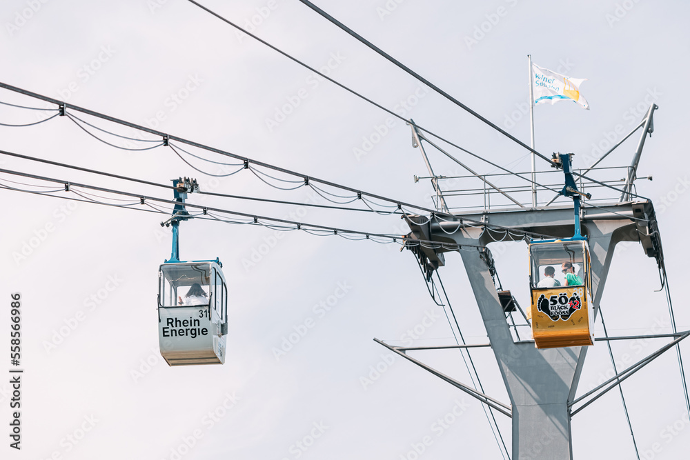 30 July 2022, Cologne, Germany: Seilbahn cable car gondolas ...