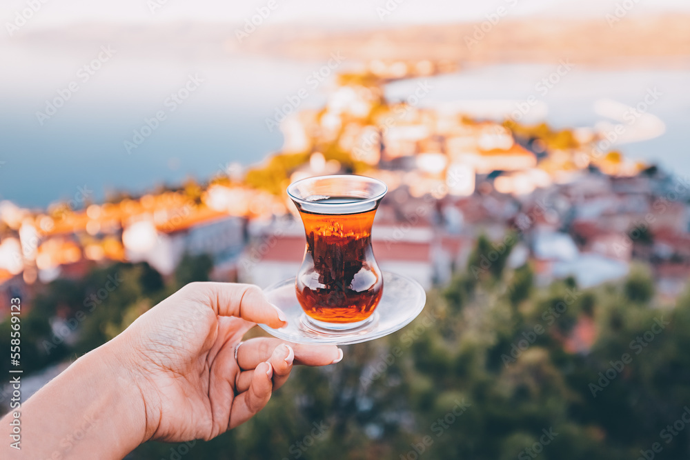 Delicious and fragrant Turkish tea in a traditional authentic bardak ...